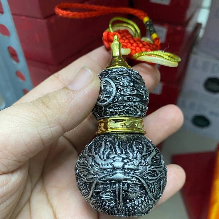 bat-lua-diem-xang-hoa-tiet-rong-dieu-khac-hinh-qua-ho-lo-1 | Phu Kien Casu